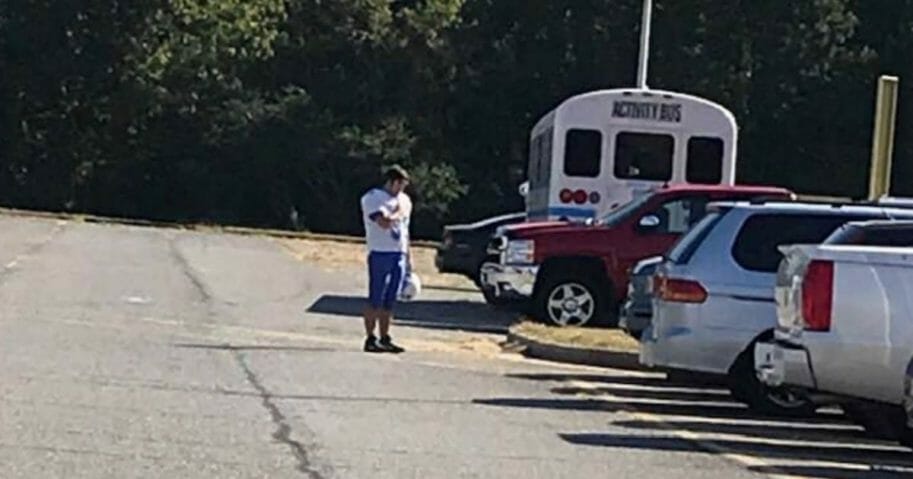 Teen Walking Through Parking Lot Drops Everything To Show Respect as ...