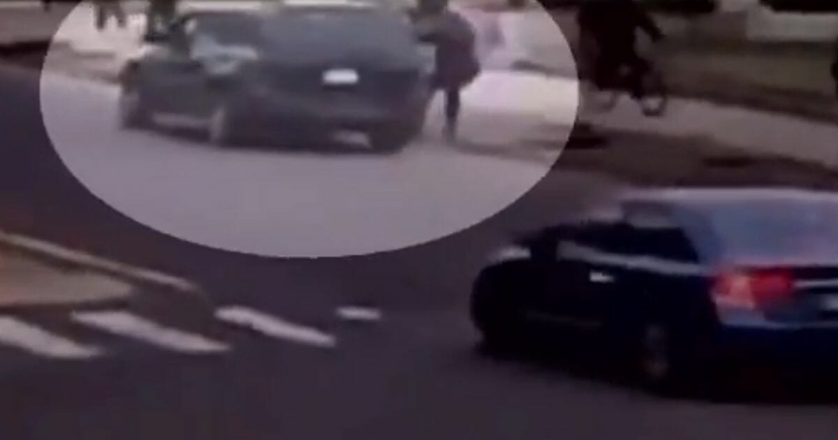 Heroic Police Officer Uses Bare Hands To Stop Runaway SUV