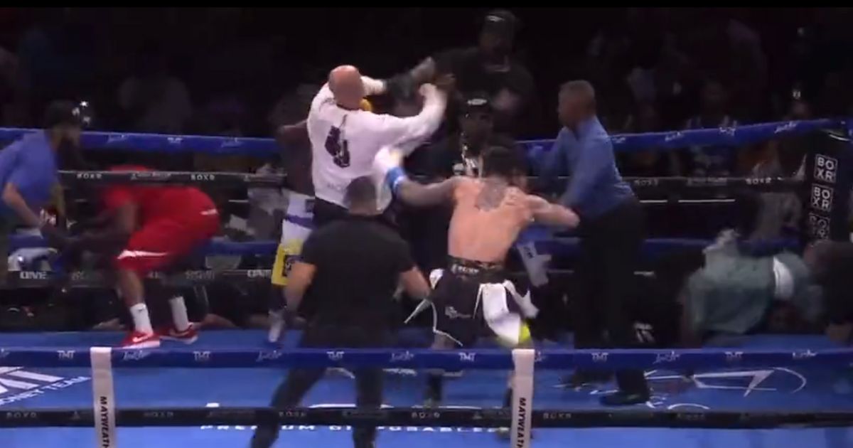 Ref Shoved Away as Chaos Breaks Out at Boxing Legend's Exhibition Fight